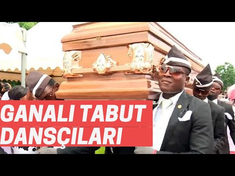Gana'daki sıra dışı cenazede dansçılar Gana'daki sıra dışı cenazede dansçılar