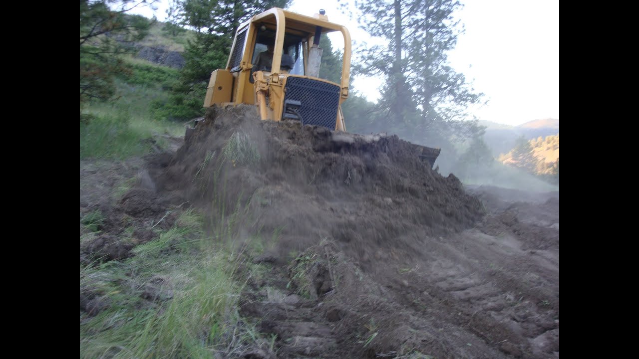 John Deere 850 Dozer With 3 Shank Ripper - Cuts in a New Road - YouTube