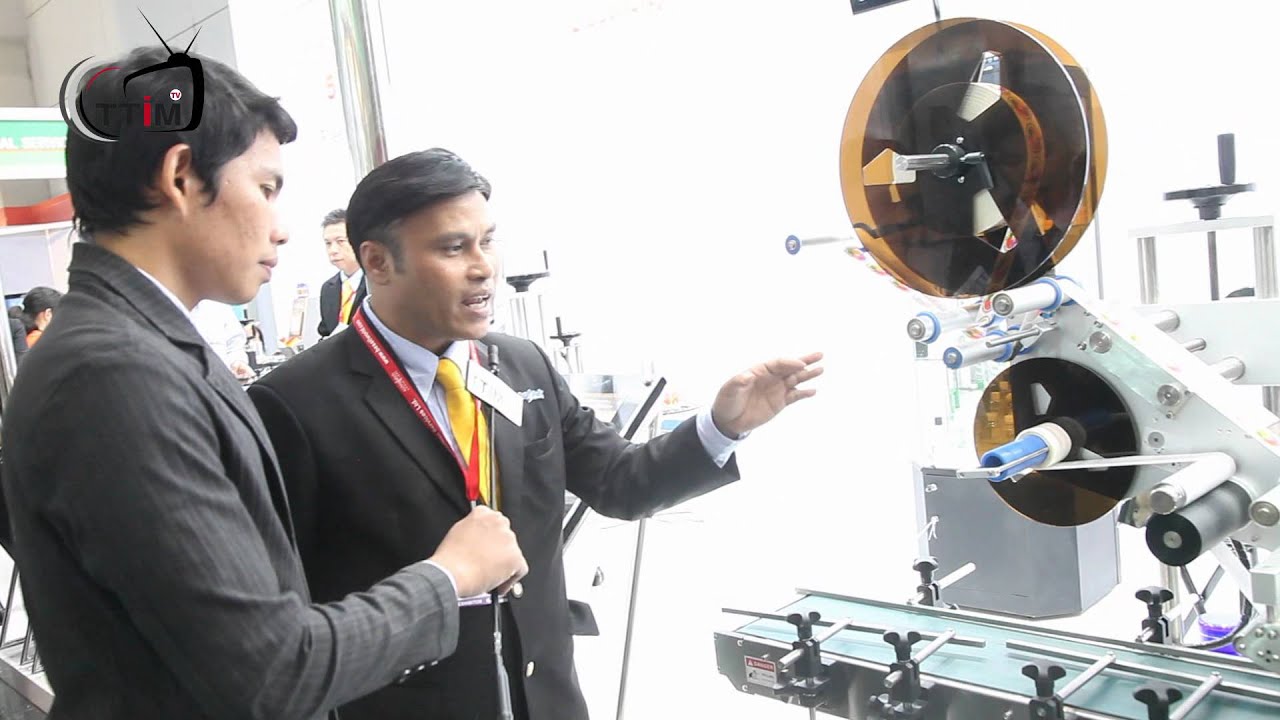 สาธิตการทำงานเครื่องติดฉลากของ Auto Pak - YouTube