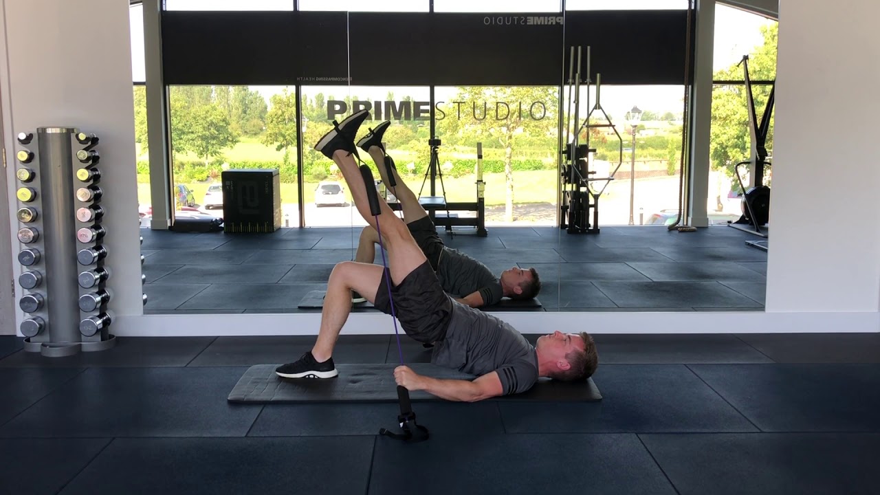 Resisted single leg bridge with pattern assistance - YouTube