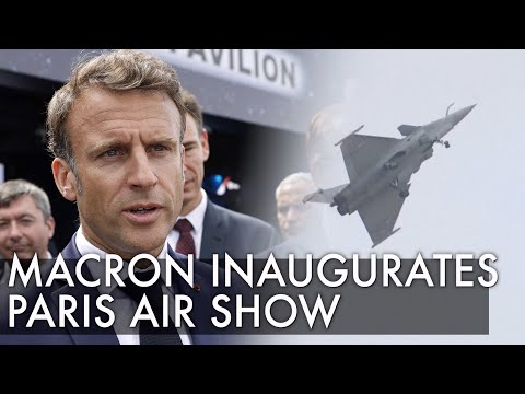 Macron, arriving in a H-160 French military helicopter, inaugurates Paris Air Show