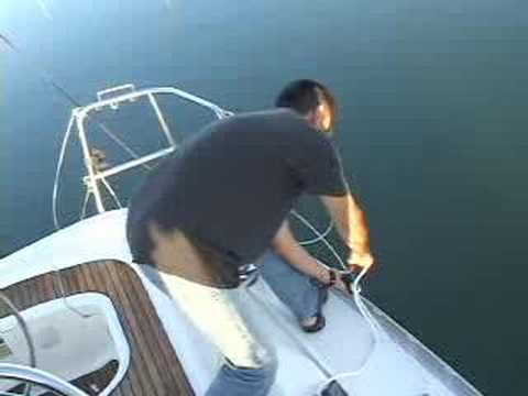 Setting up a preventer to control the boom on a sailboat - YouTube