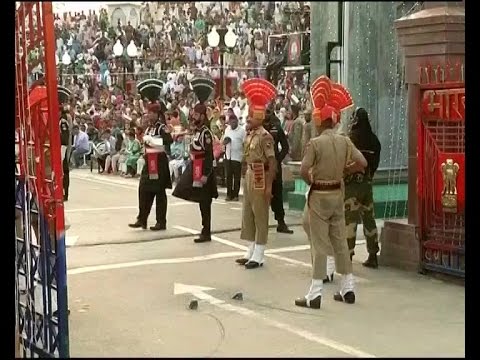 Have a look at the Beating Retreat ceremony at Atari-Wagah border - YouTube