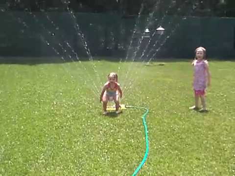 kids playing in sprinkler - YouTube