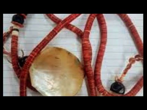 The daunting task of making colourful red Bagi necklaces - YouTube