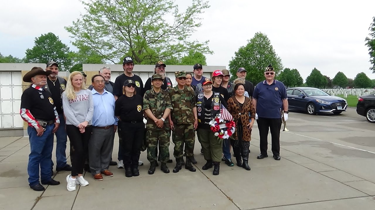 Placing flags at Fort Snelling National Cemetary - YouTube
