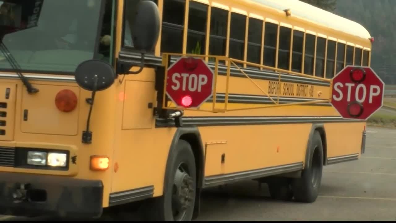 Extended school bus stop signs make roads safer in Bigfork - YouTube