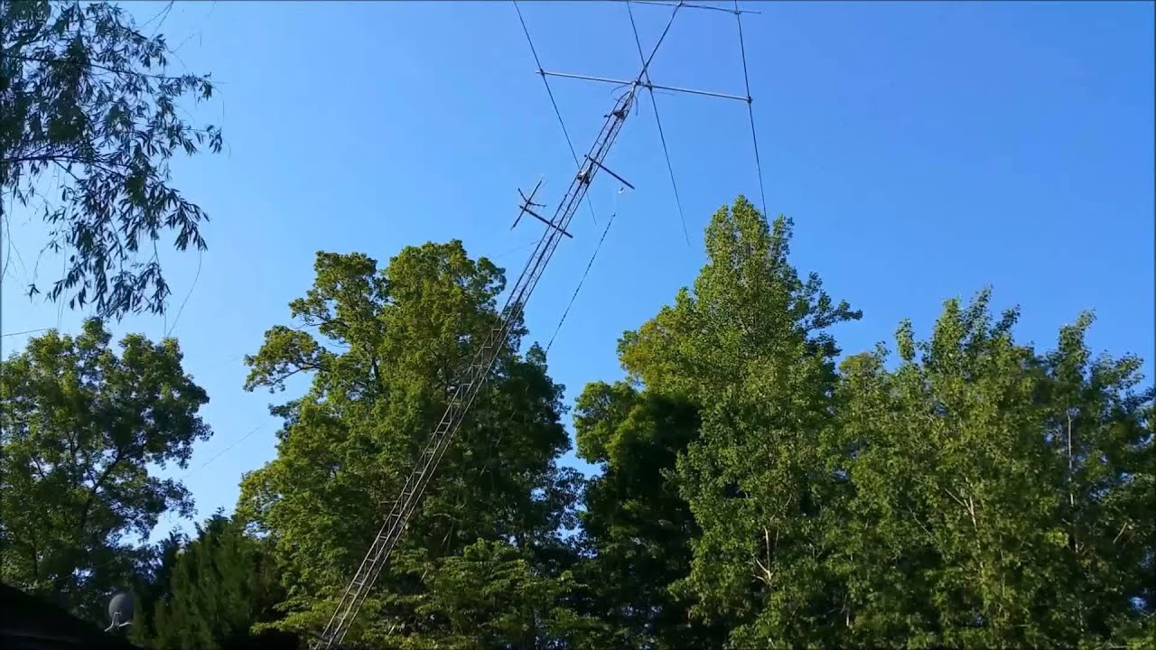 Lowering and Raising 60' Rohn 25 Tower, Homemade HInge - YouTube