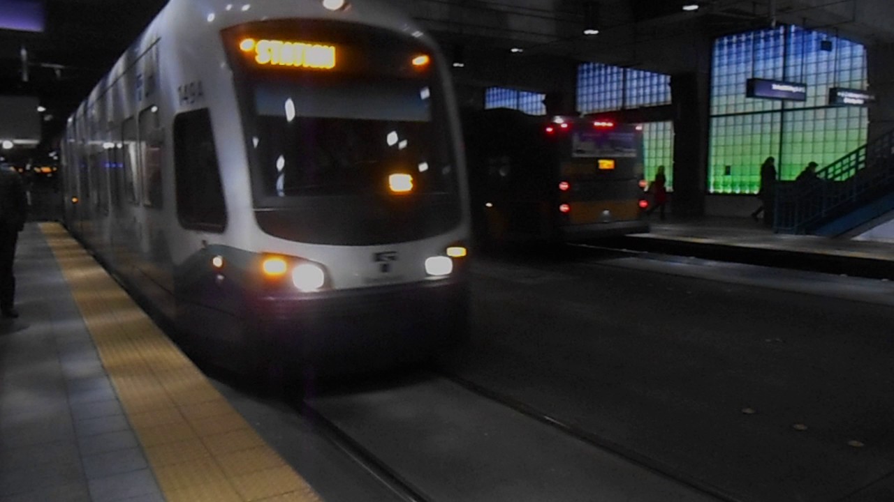 Link light rail train arriving at International District - YouTube