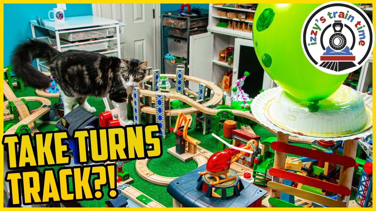 Train track building by TAKING TURNS! - YouTube