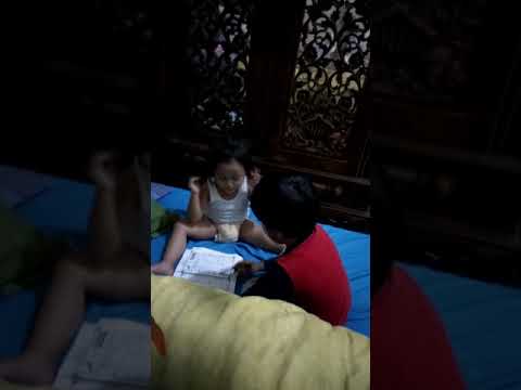 Lagi ajarin adik ngaji