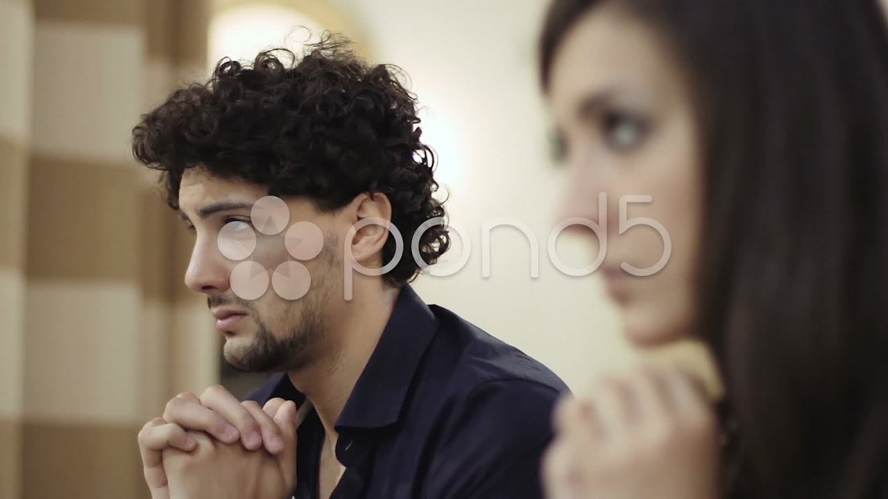 desperate man praying in a church. Stock Footage - YouTube