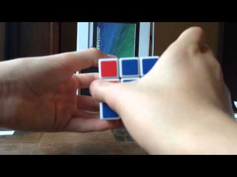 How to solve a Rubik's cube in Spanish - YouTube