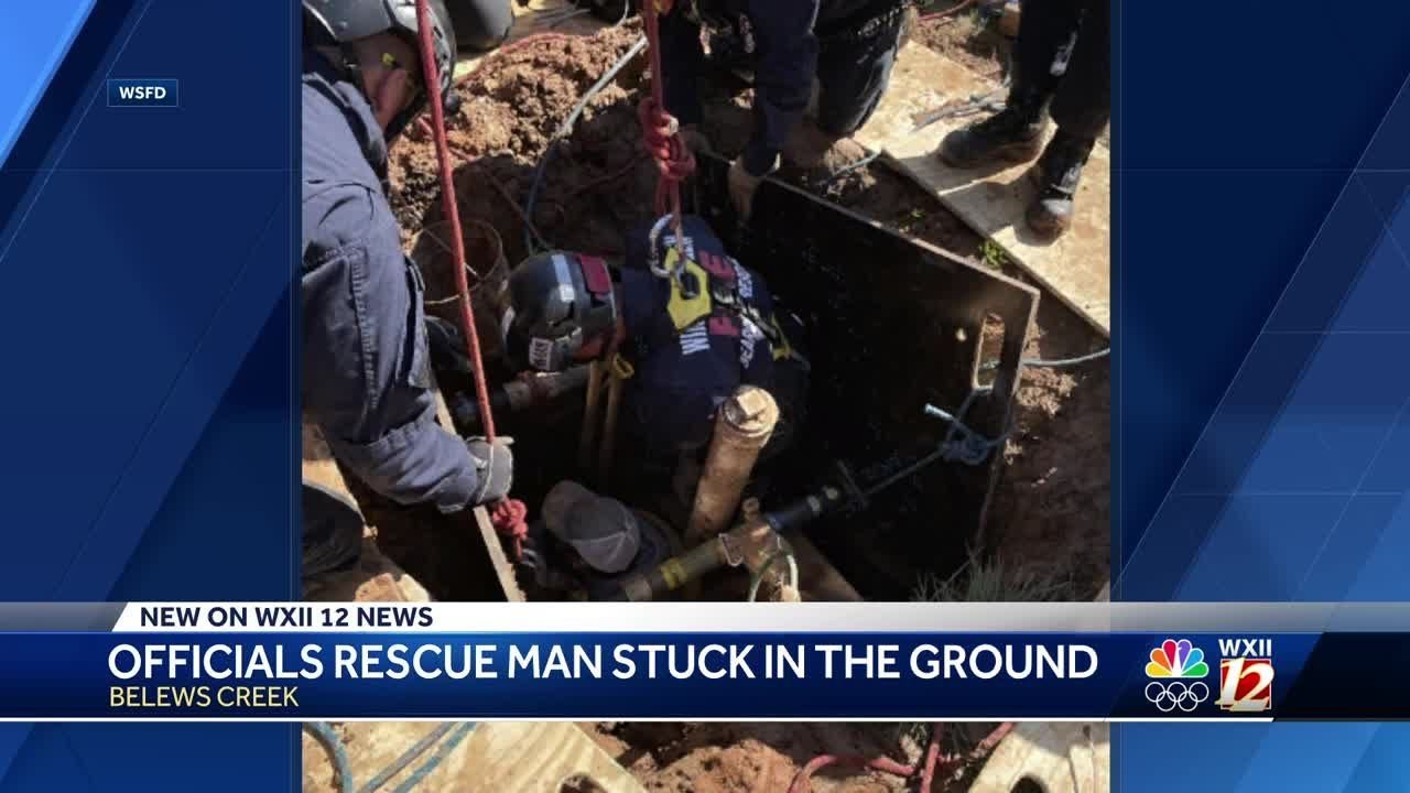 Triad crews rescue man trapped in trench - YouTube