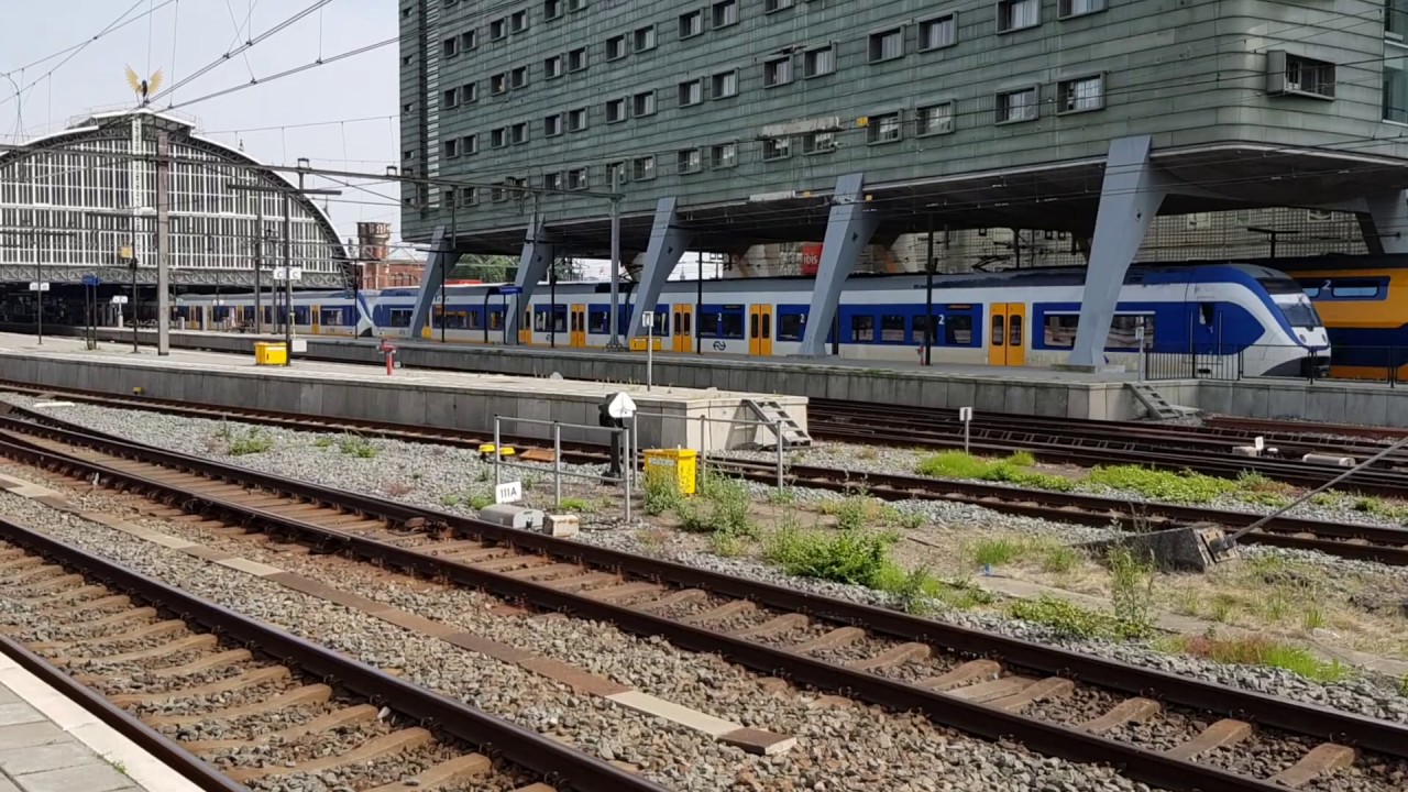 NS Sprinters 2649 +2411 arriving at Amsterdam Central Station on 25/6 ...