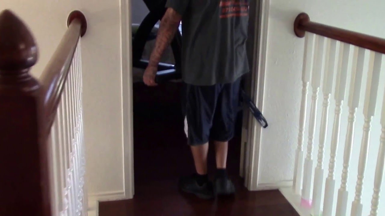 Elliptical Bike Moving Upstairs by Rescue Moving Services - YouTube