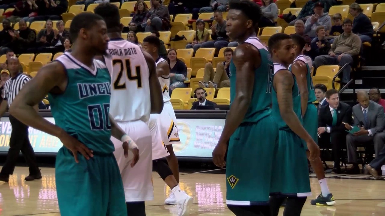 Towson Men's Basketball Drops CAA Opener to UNCW Seahawks - YouTube