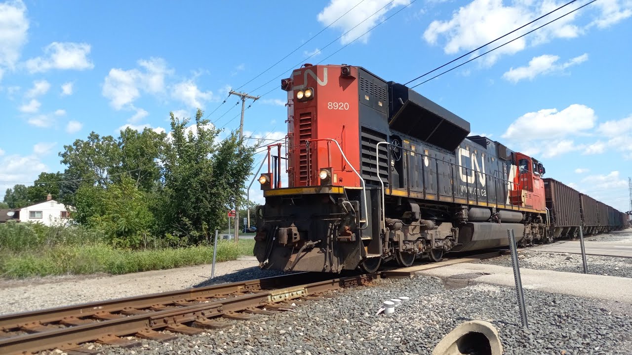 CN SD70M-2 leads the local coal train - YouTube