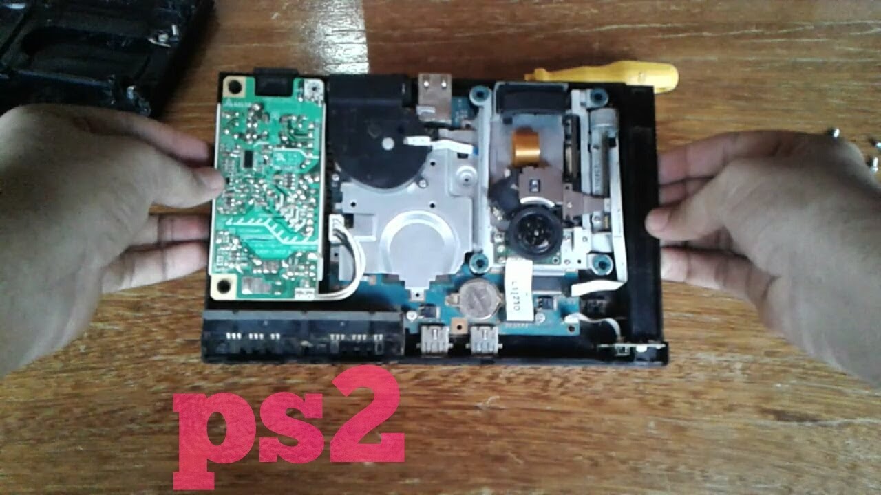 ABRINDO UM PLAYSTATION 2 - YouTube