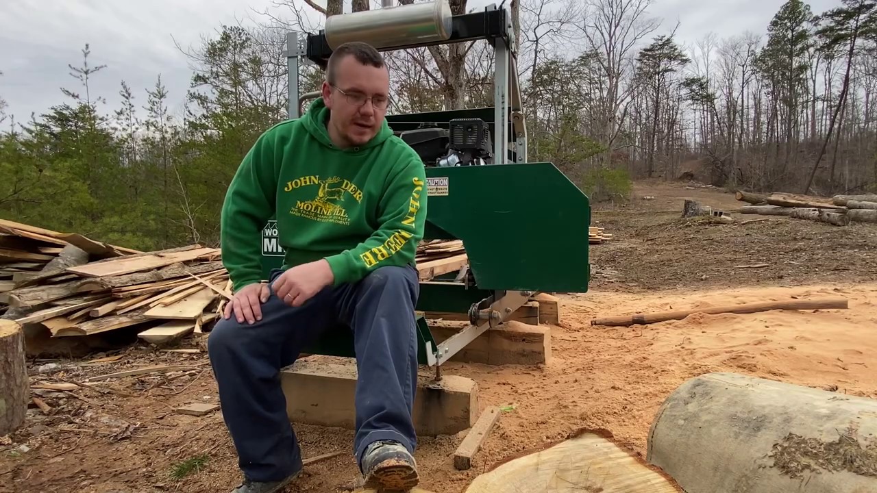 Cutting lumber (band mill / woodland mills) - YouTube