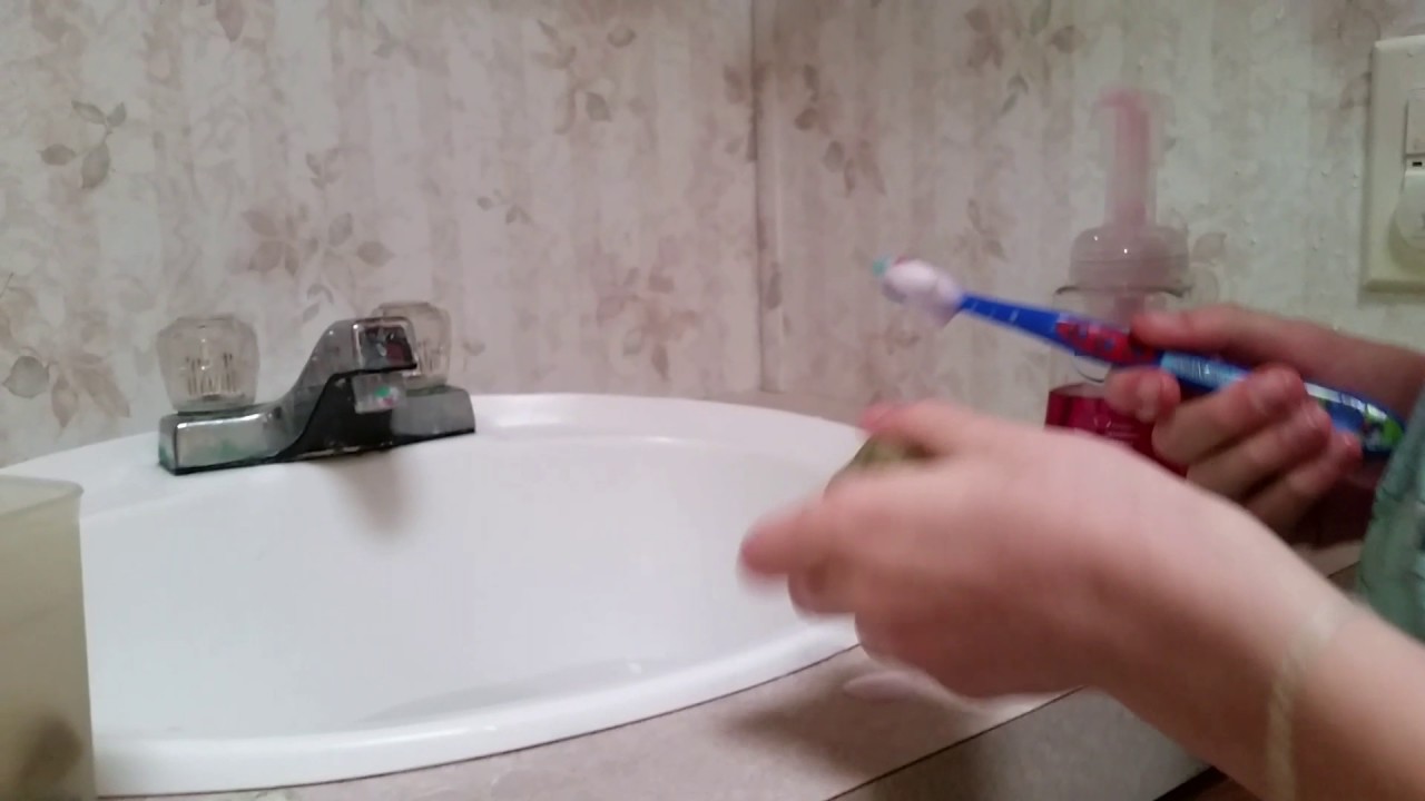 How to wash rocks with a toothbrush - YouTube