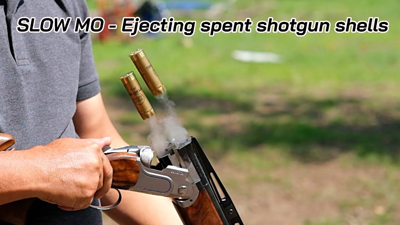 SLOW MO - Ejecting spent shotgun shells - YouTube