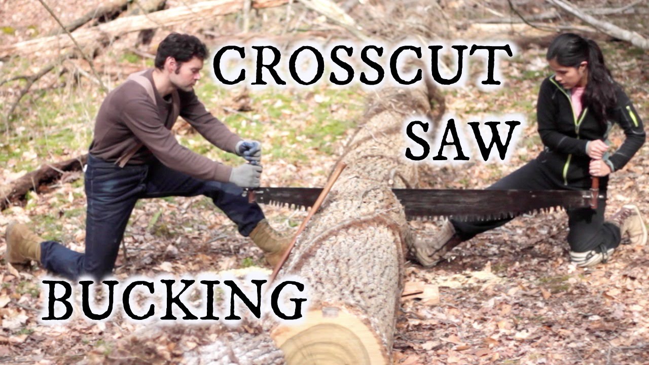 Crosscut saw bucking - YouTube