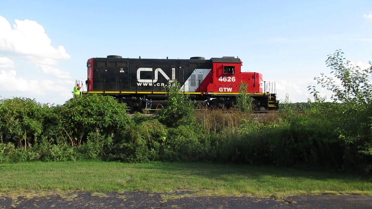 Bell ringing as the CN GP9R GTW 4626 rolls up the siding to the ...