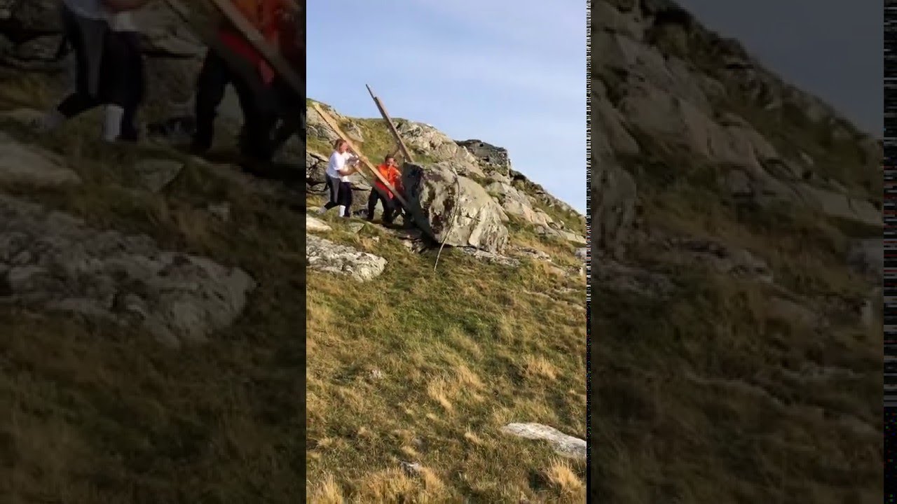 Rolling a Huge Rock || ViralHog - YouTube