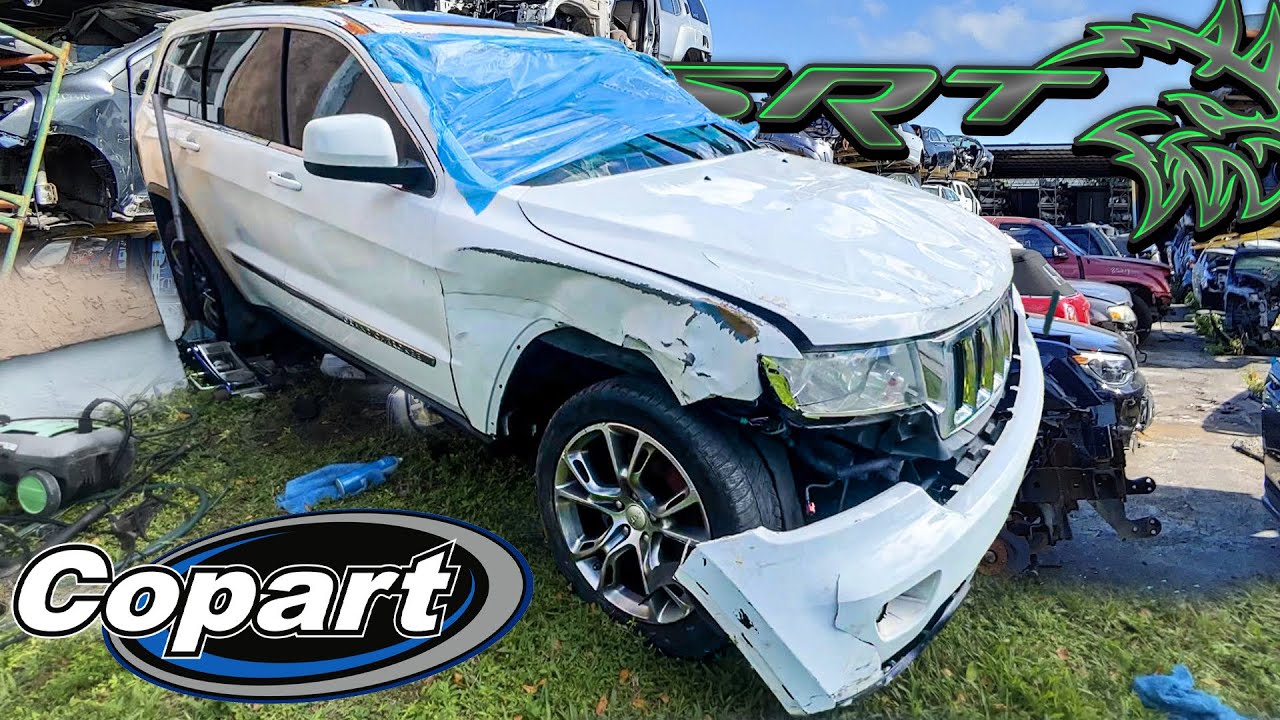 Rebuilding The Copart SCAM Rolled Over Jeep SRT At The BodyShop - YouTube
