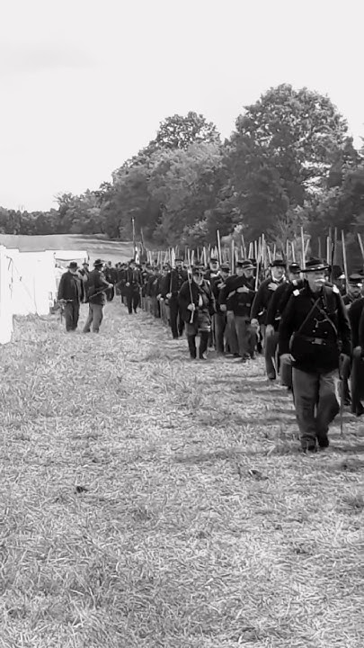 Old film style footage of the United States Volunteers at 160th ...