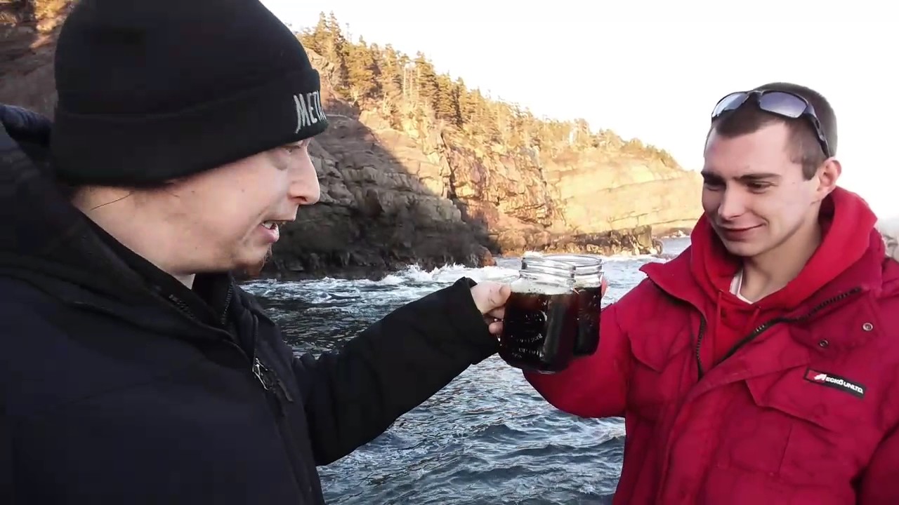 Drinking screech with iceberg ice we got off the shore!! - YouTube