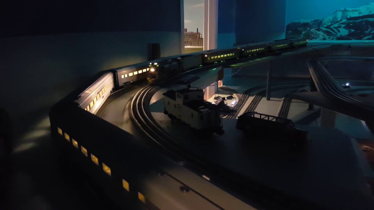 Lionel gold polar express and Empire state Express run at night - YouTube