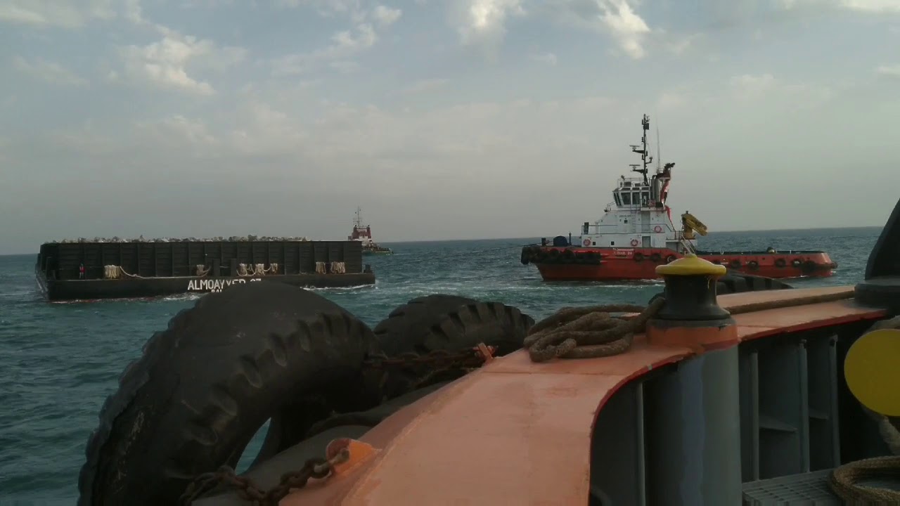 loaded barge | Grounding | Ras alkhair port - YouTube