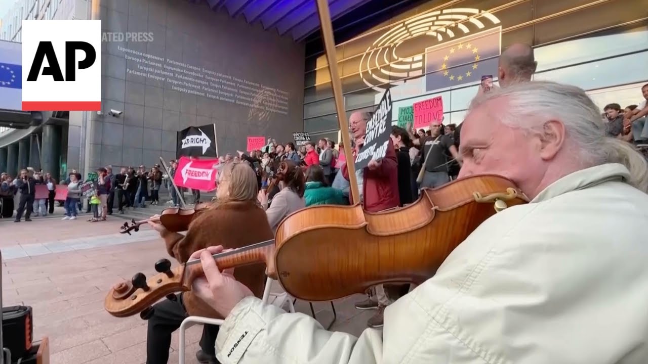 Orchestra plays outside European Parliament at protest against rise of ...