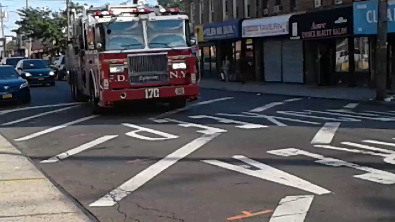 MORON TRIES TO PASS FDNY LADDER 170. - YouTube