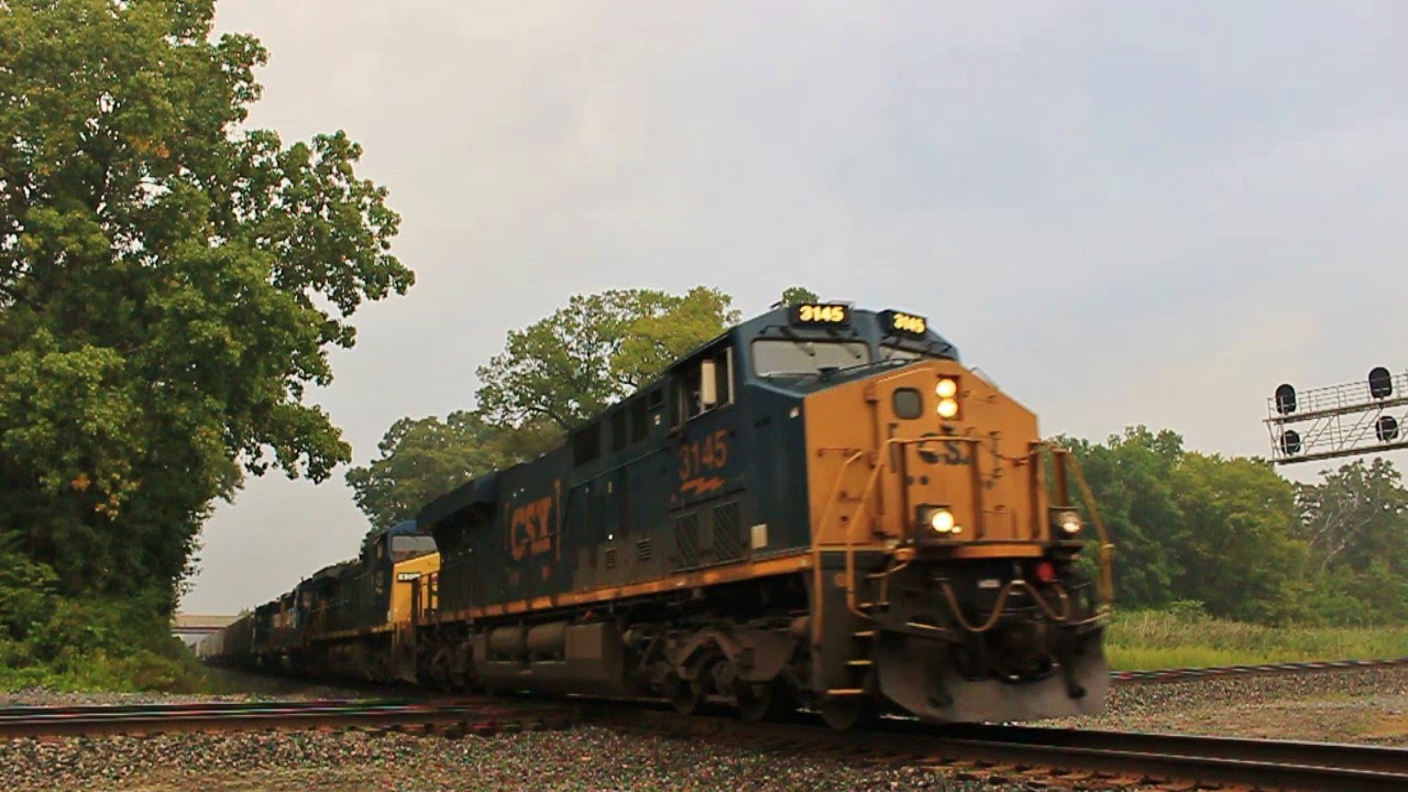 CSX GEVO, AC44CW, and a pair of freshly rebuilt GP40-3's head south w ...