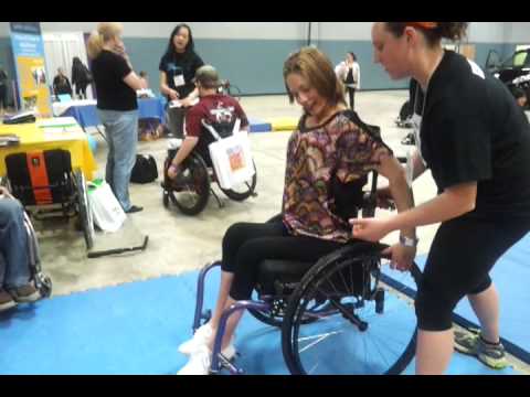Abilities Expo Nina learning how to do and hold a wheelie in her ...