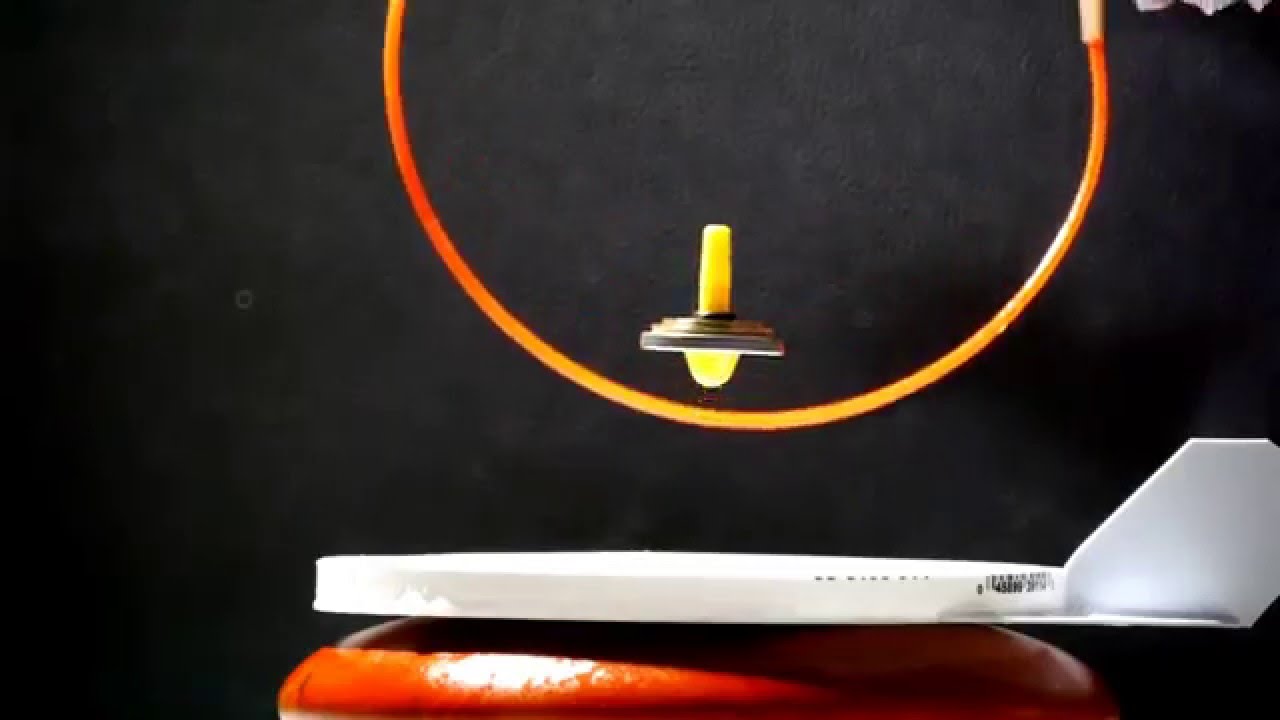 Levitron floating top inside of a soap bubble 2 - YouTube