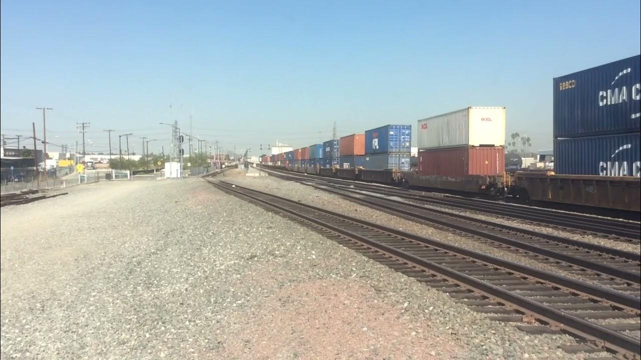 BNSF 5032 leads Z train with a fake bonnet and a ex fake bonnet - YouTube