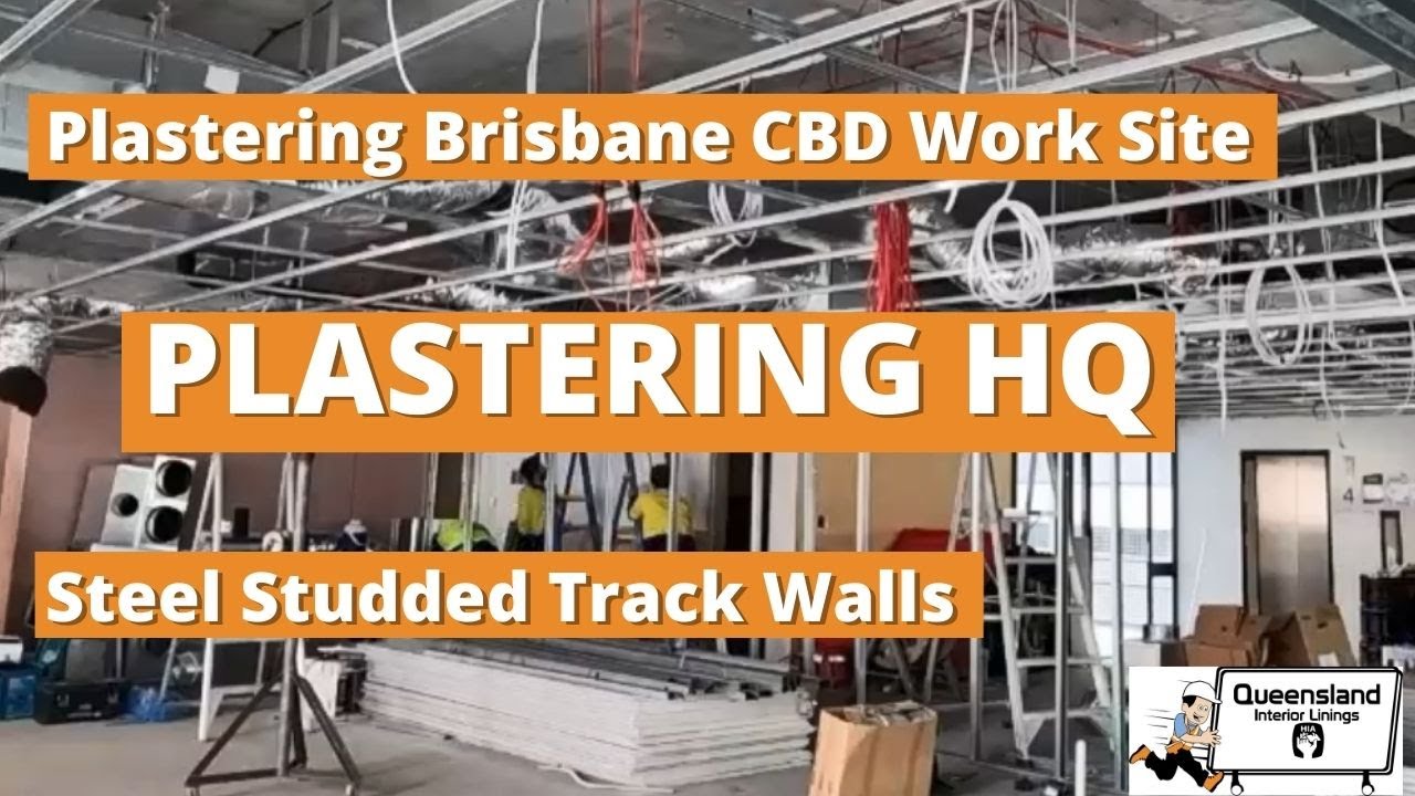 Plastering Metal Stud Frames With Drywall Contractors On Building Site ...