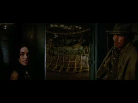 Megan Fox takes down two guys: a knee strike and a punch to the balls. (Jonah hex)
