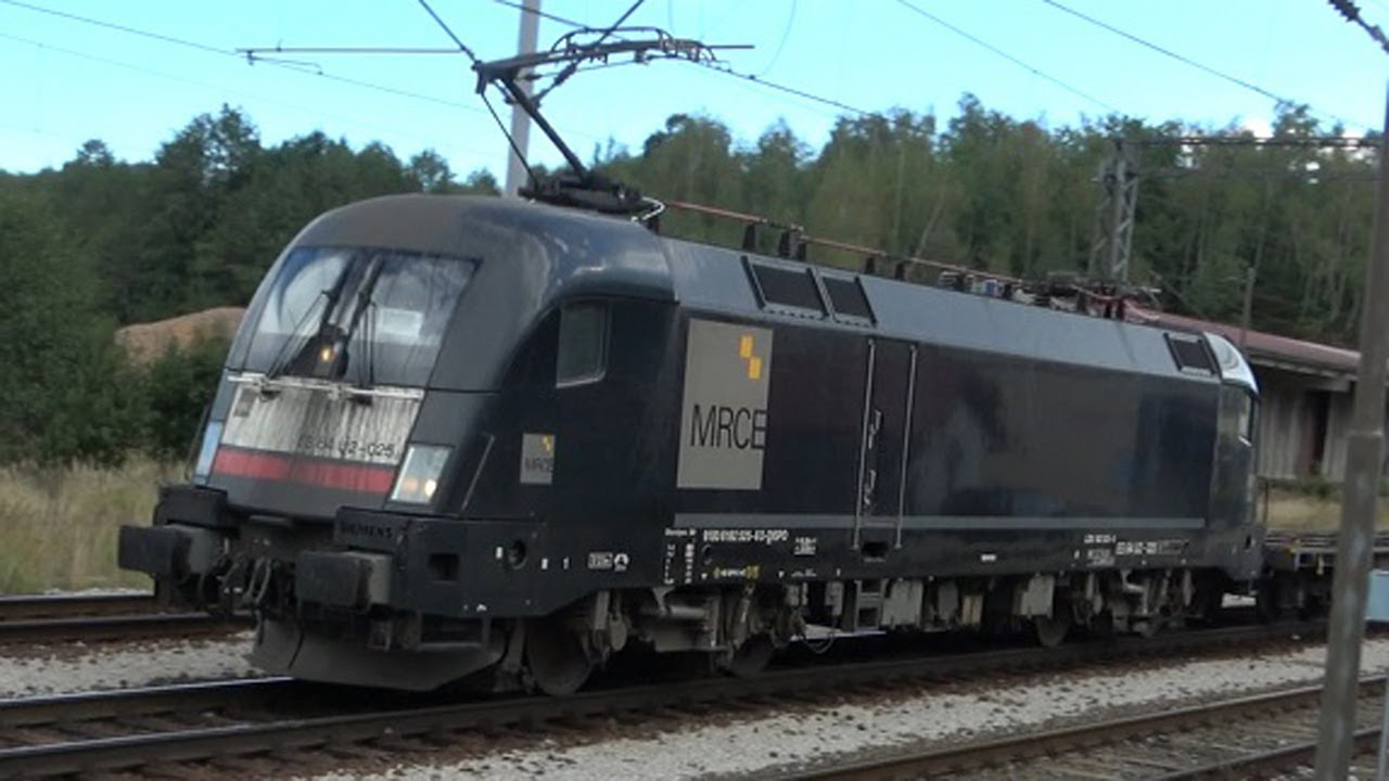 MRCE empty flat wagons freight train, Locomotive: Taurus ES64 9180 6182 ...
