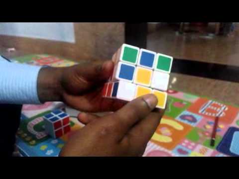 3x3 Step 1 Solving edge pieces in top layer - YouTube