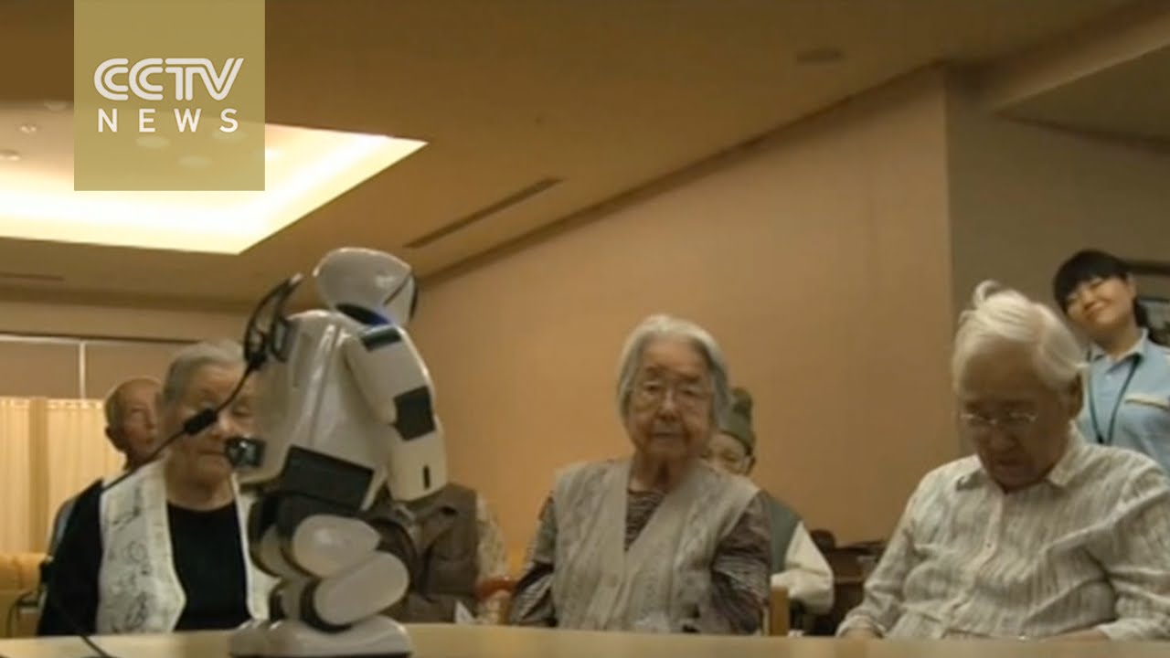 Robots assist with social care in Japan - YouTube