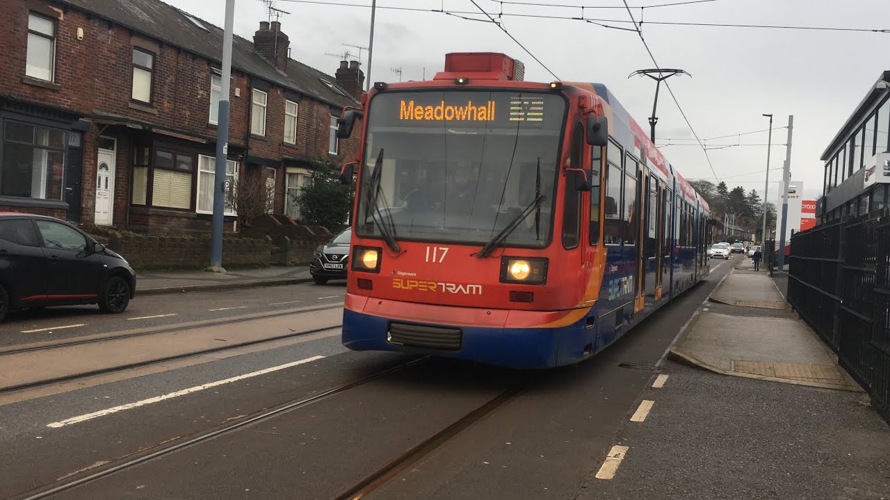 Sheffield Supertram 117 heads down Middlewood Road with a Yellow Route ...
