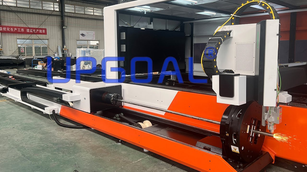 2KW Tube Plate Fiber Laser Cutting Machine with Exchange Table - YouTube
