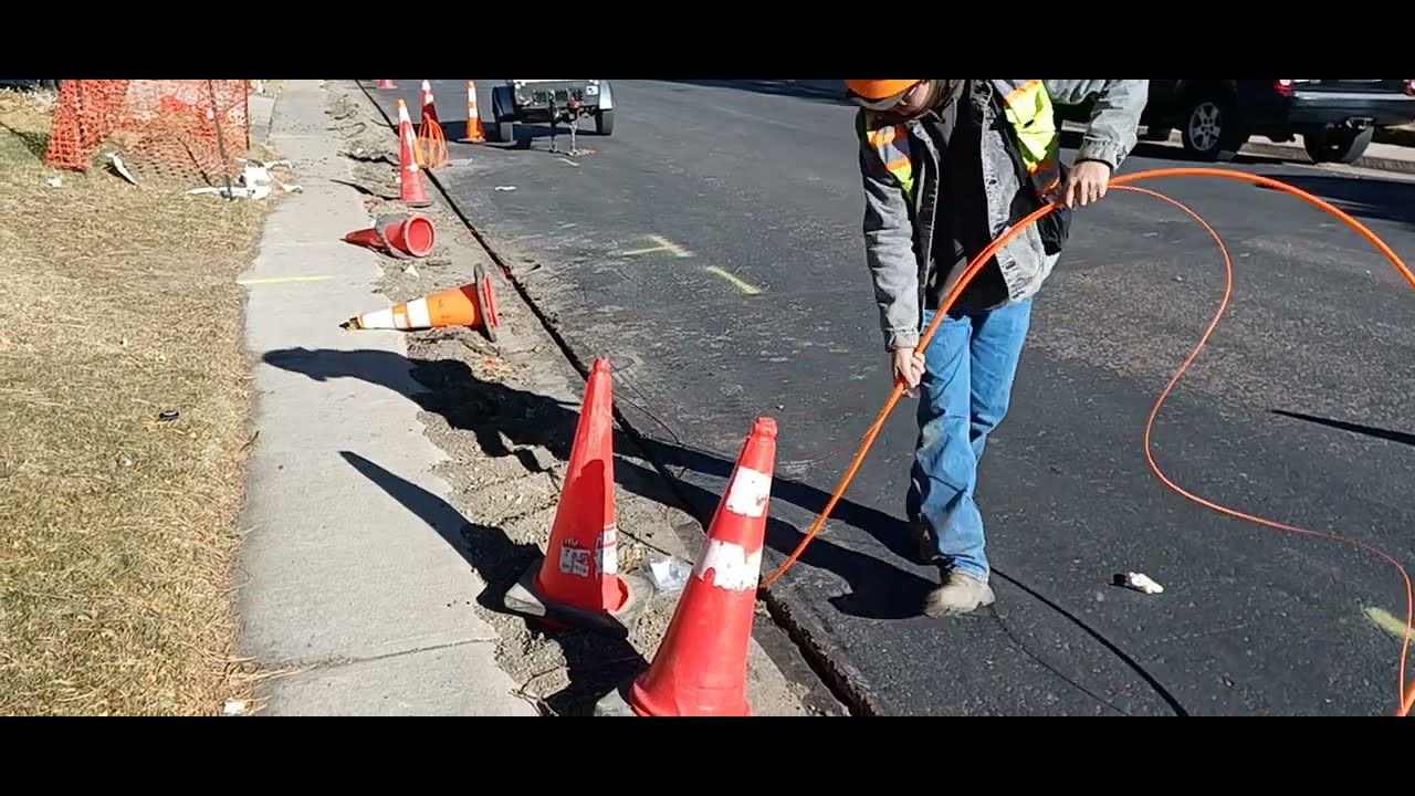 "Micro Trench" for Google Fiber along the street - YouTube