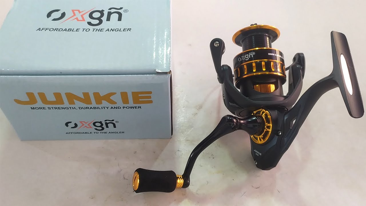 Oxgn Junkie Reel Murah Body Rotor Titan Graphite & Suara Clicker ...