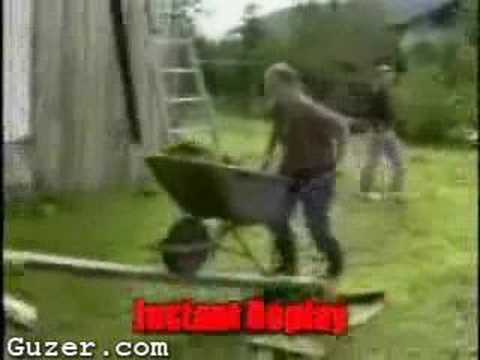 Funny wheelbarrow accident - YouTube